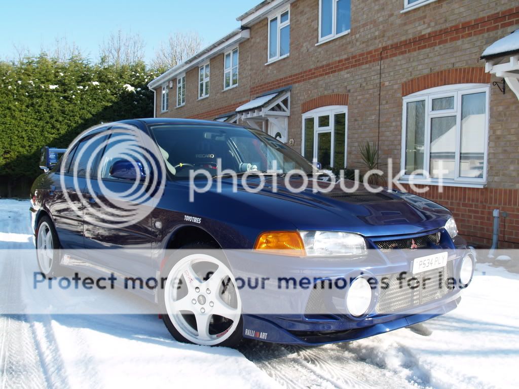 Gun Blue Car White Rims